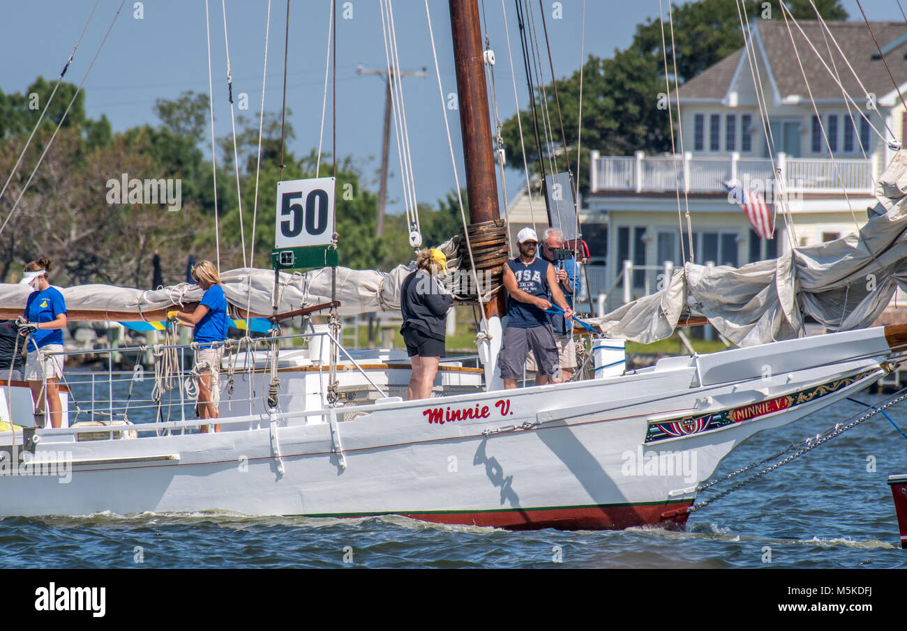 Group of people standing on traditional Skipjack ship on the Chesapeake ...