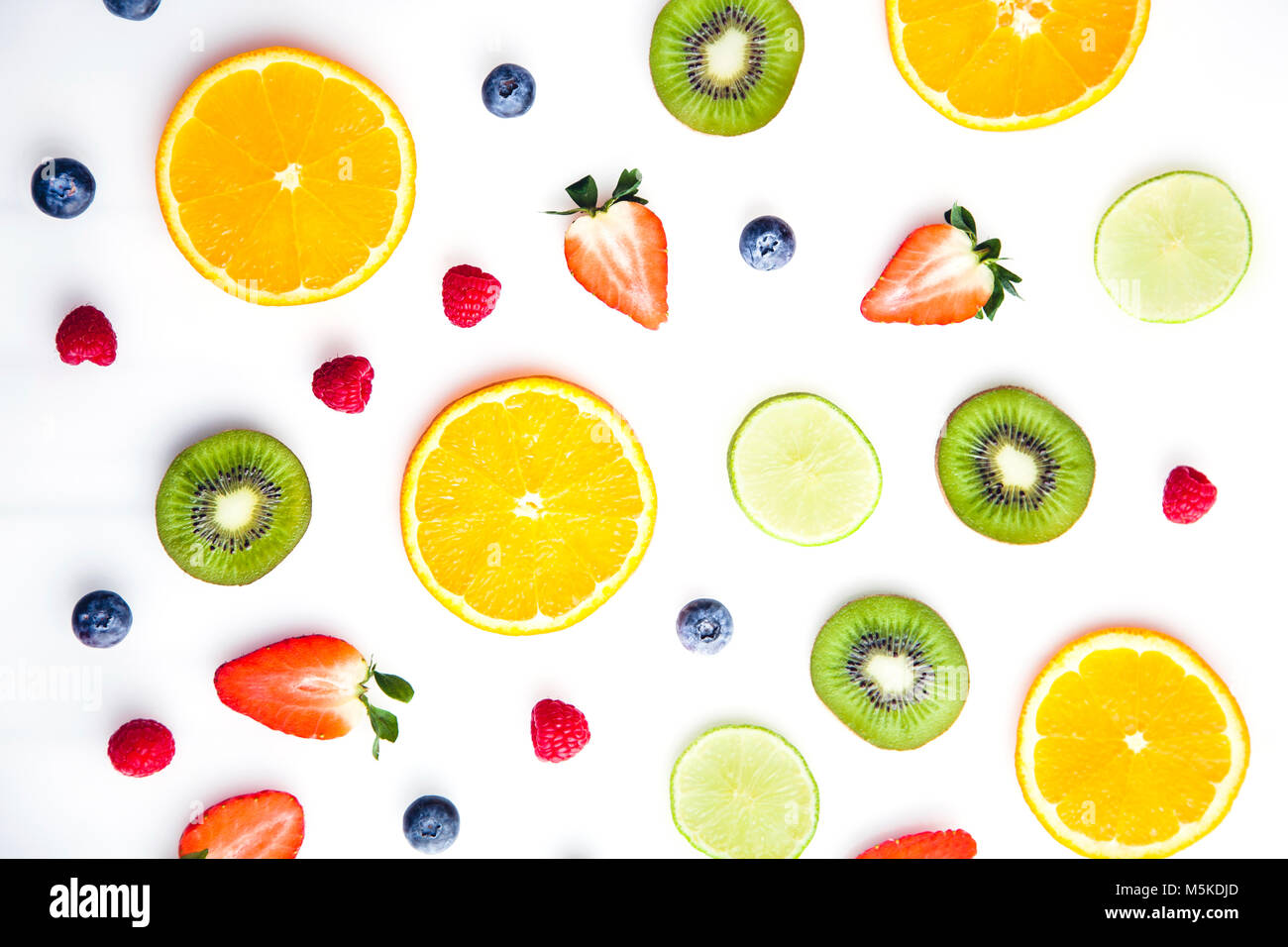 different colorful fruits as a background Stock Photo - Alamy