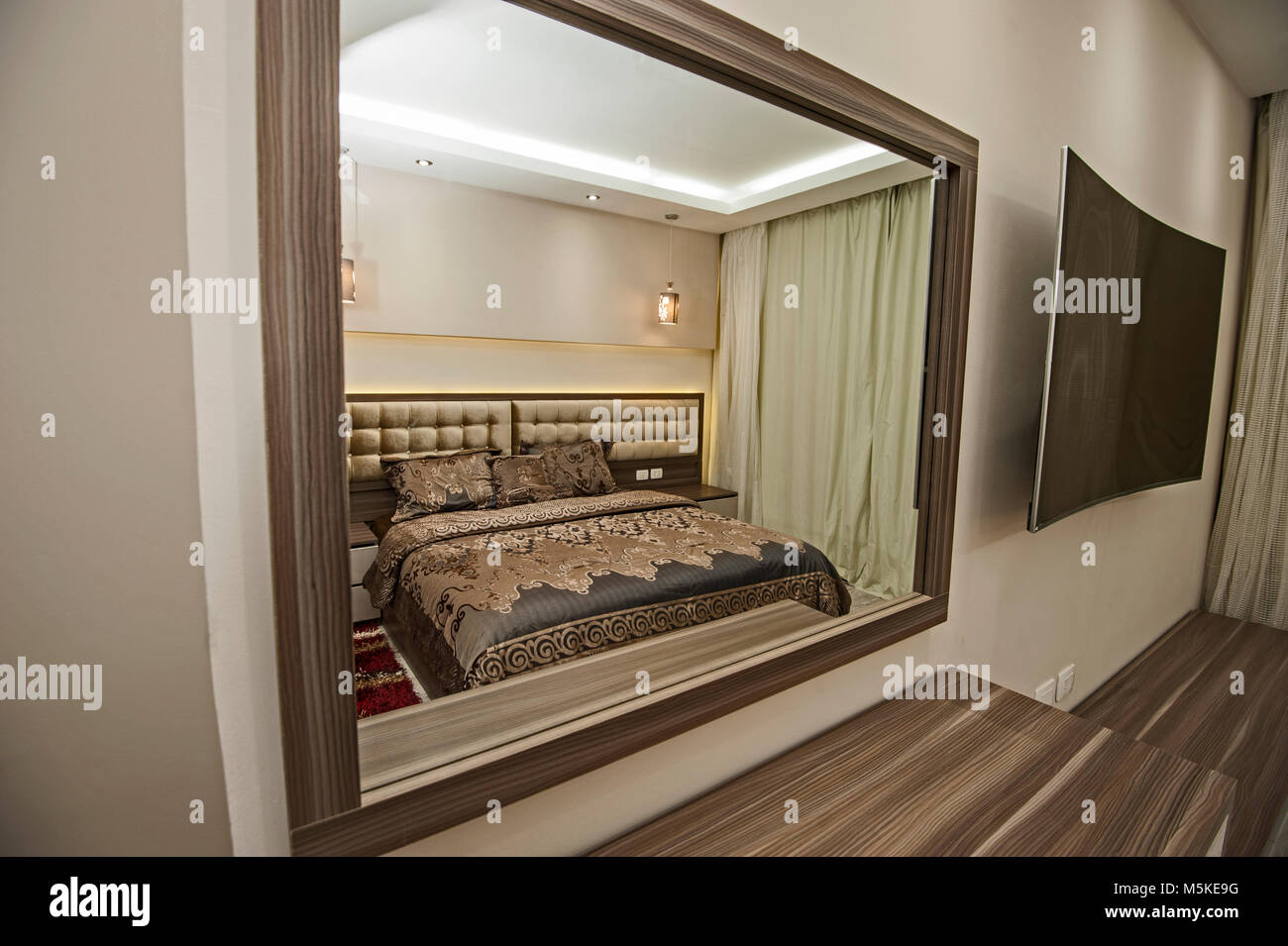 Interior design decor furnishing of luxury show home bedroom with ...