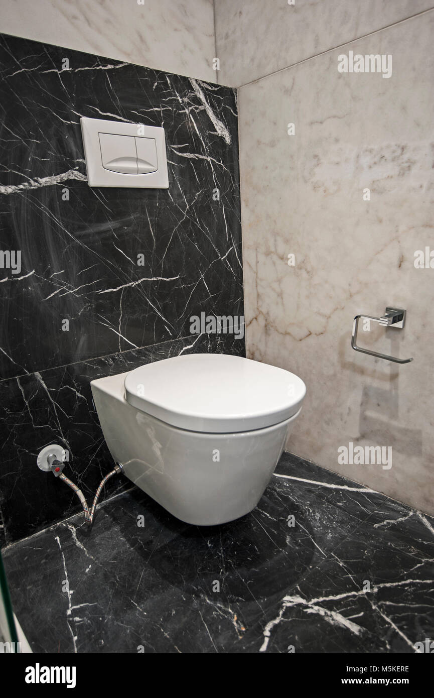 Interior design of a luxury show home bathroom with floating toilet and ...