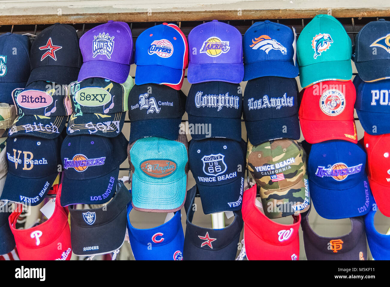 Display of many different caps in a store along the boardwalk of Venice ...