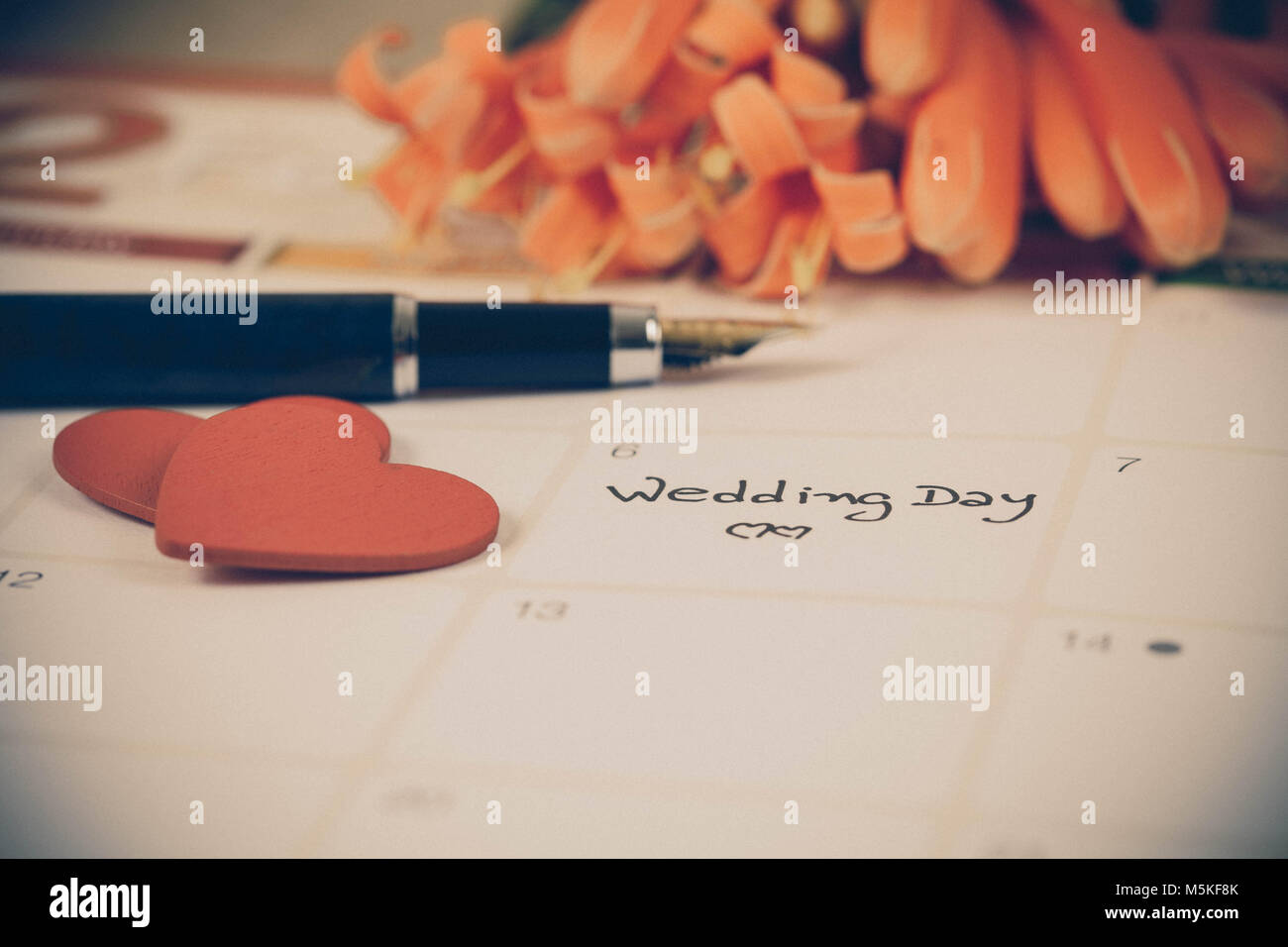 Reminder Wedding day in calendar planning and fountain Stock Photo - Alamy