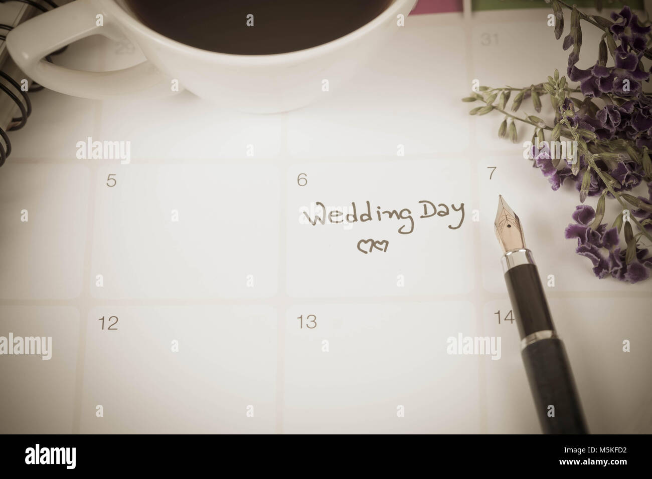Reminder Wedding day in calendar planning and fountain Stock Photo - Alamy