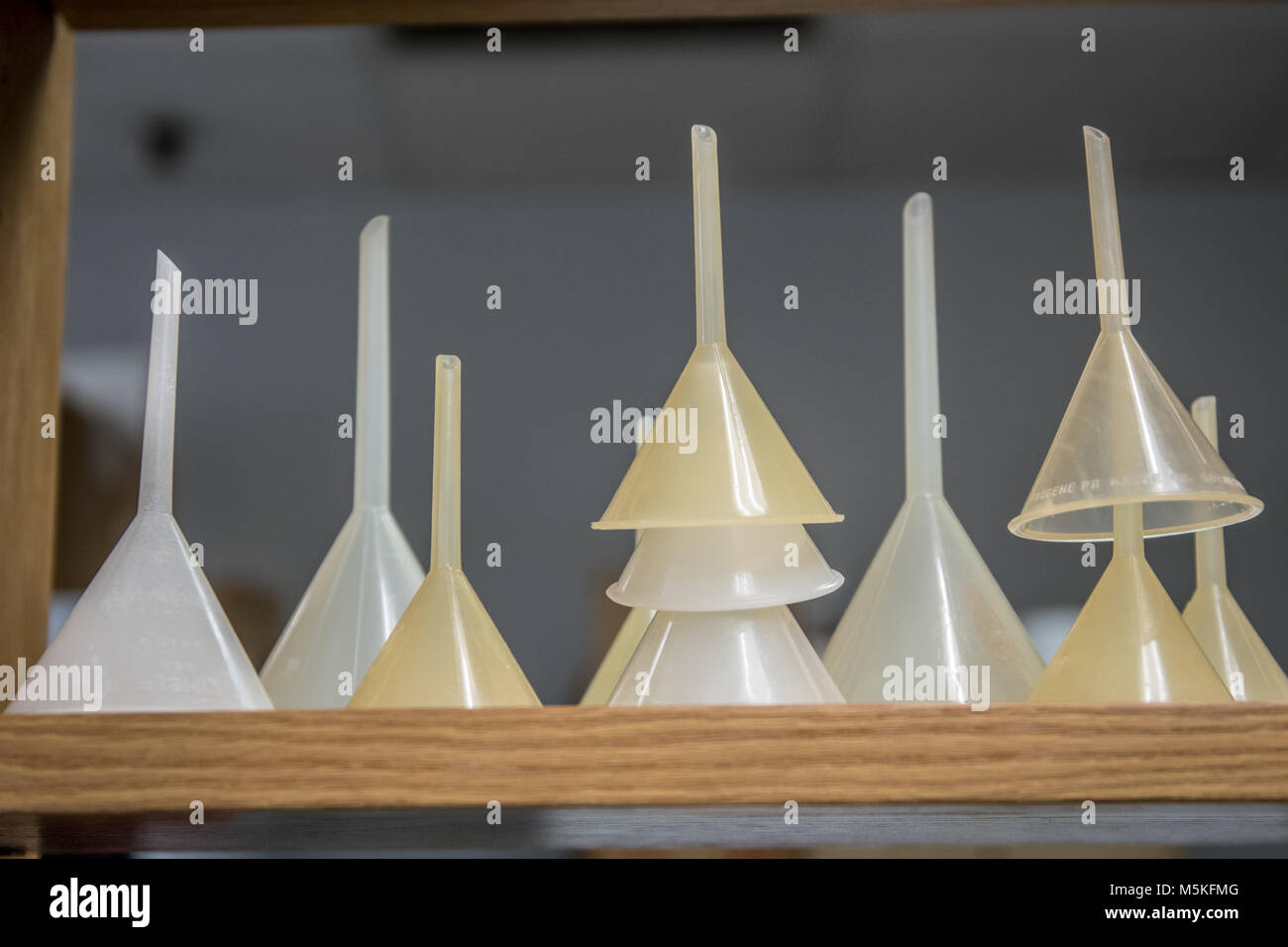 Stack of lab funnels sitting on wooden shelf, Tifton, Georgia Stock ...