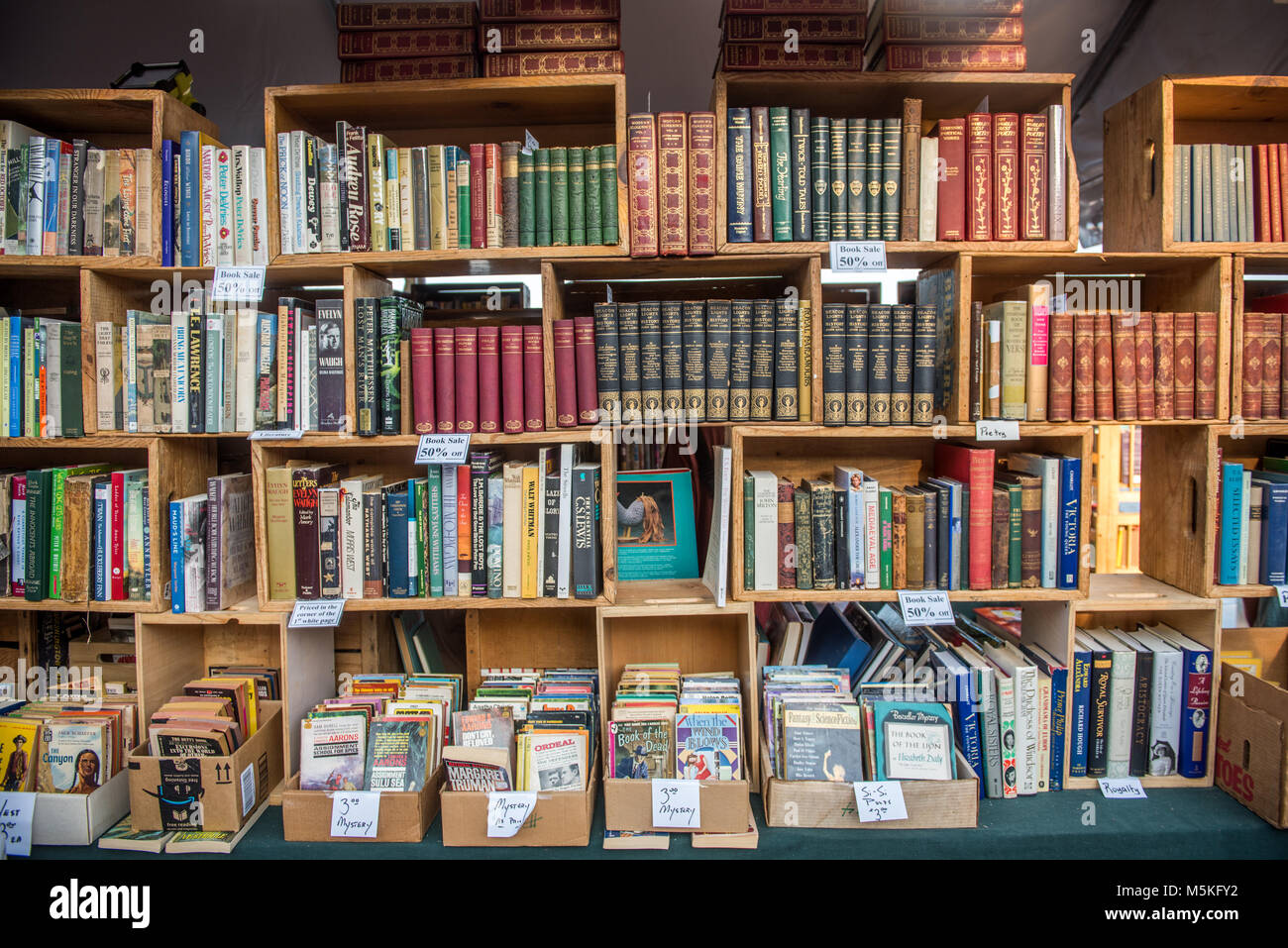 Book shelf displaying numerous novels for sale, Baltimore, Maryland ...