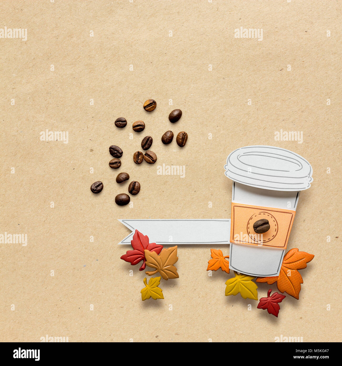 Creative concept photo of a cup of coffee made of paper on brown ...