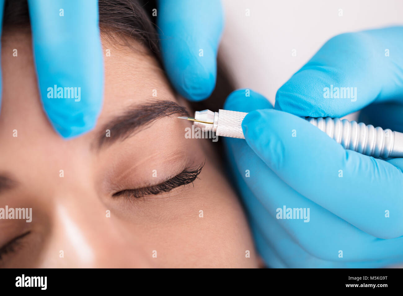 Woman machine face treatment hi-res stock photography and images - Alamy