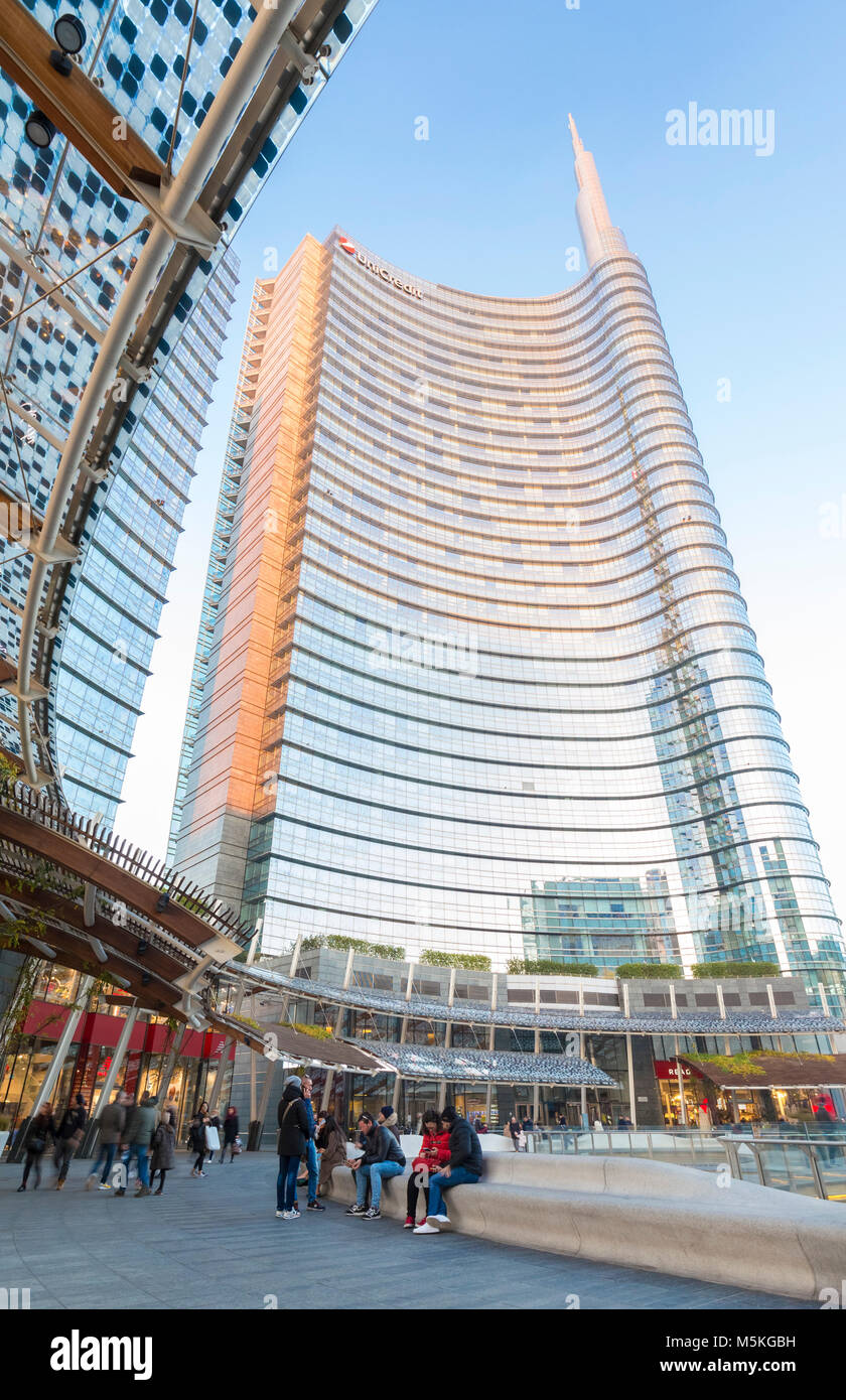 View of the Unicredit Tower spire from the Gae Aulenti square. Milan ...