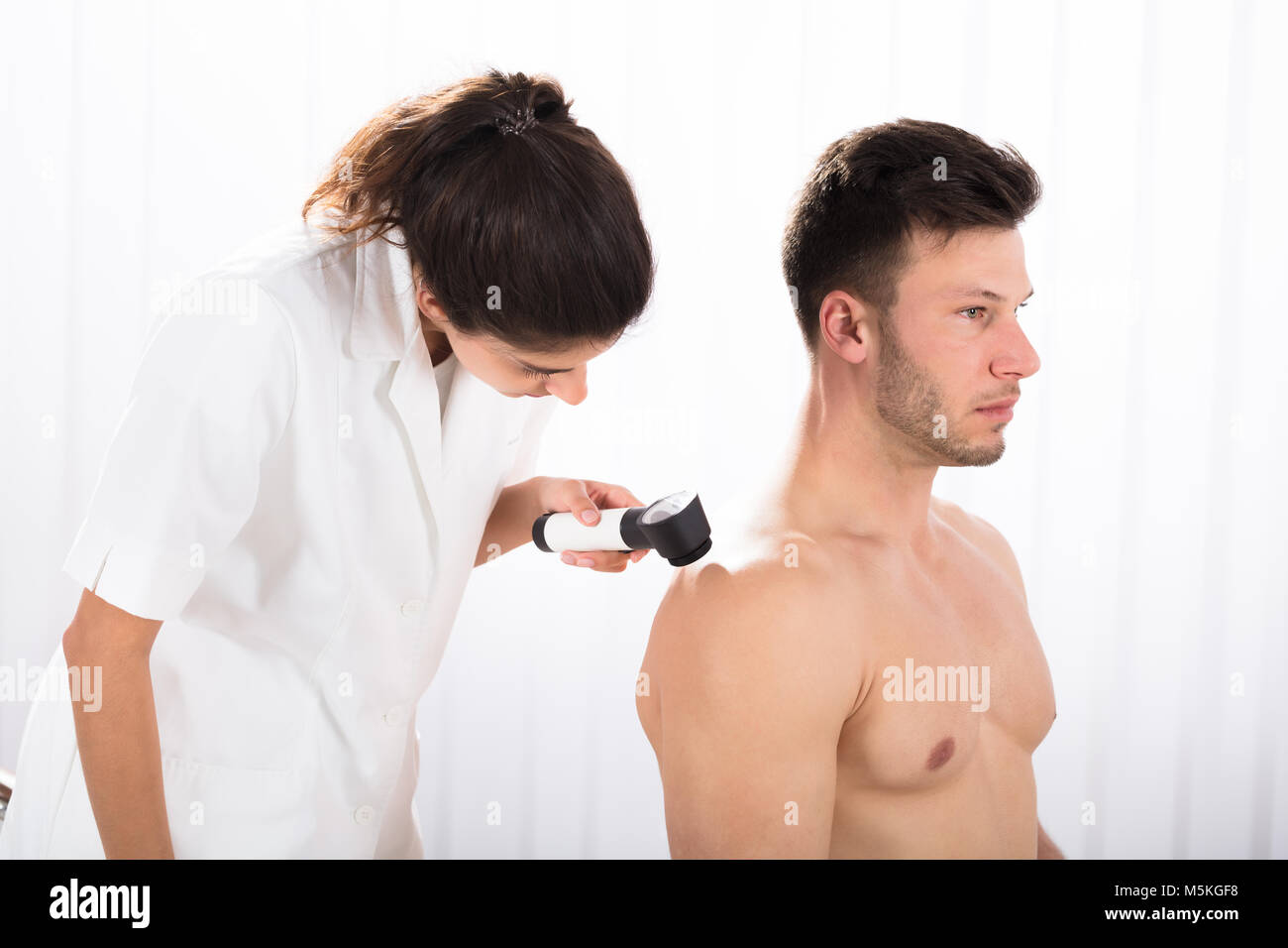 Dermatology examination hi-res stock photography and images - Alamy