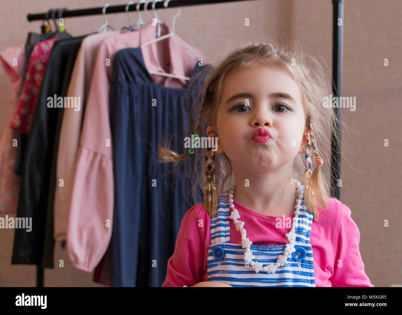 Child choosing clothes hi-res stock photography and images - Alamy