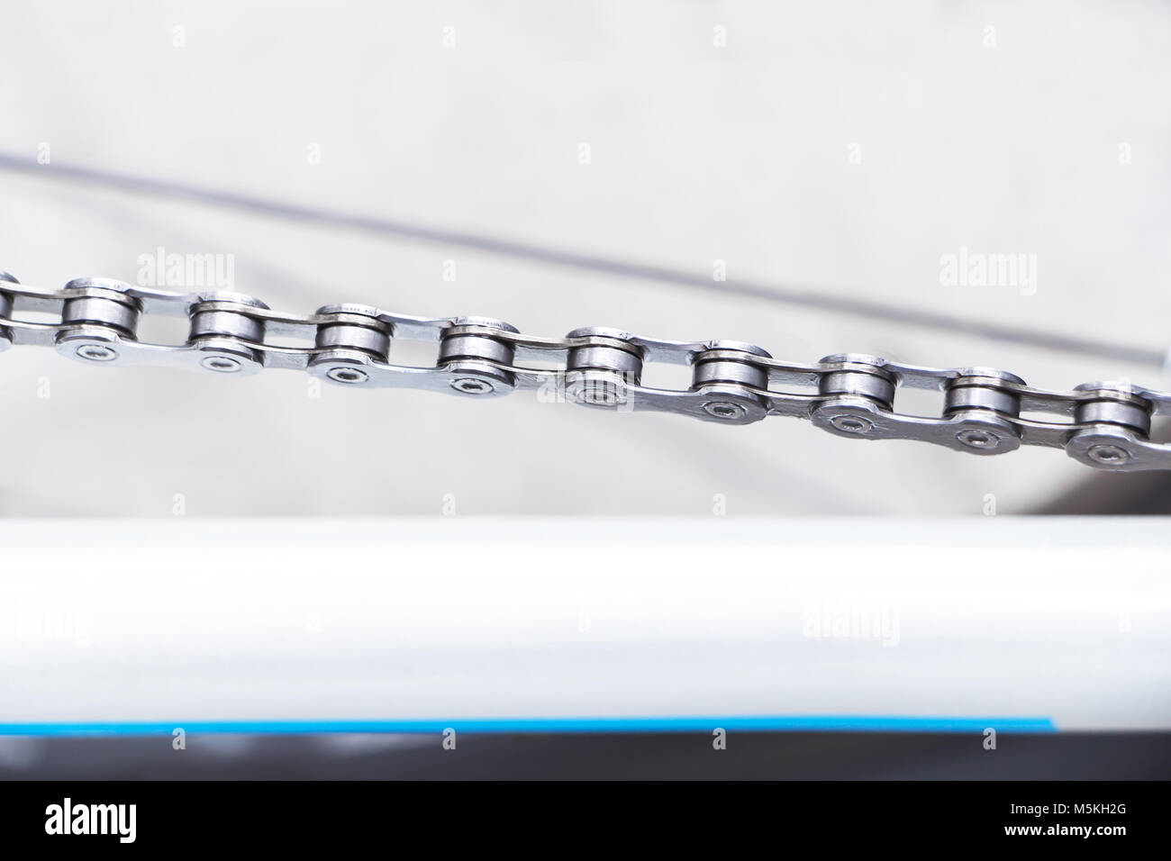 New and clean silver mountain bike chain detail for wallpaper or ...