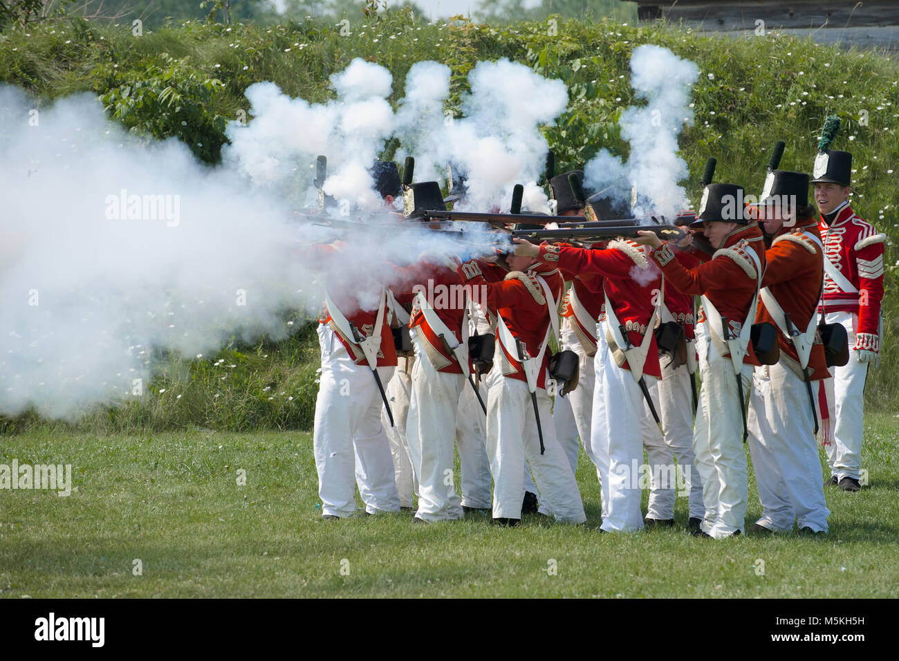 A musket firing demonstration at the Fort George Historic Site, Niagara ...