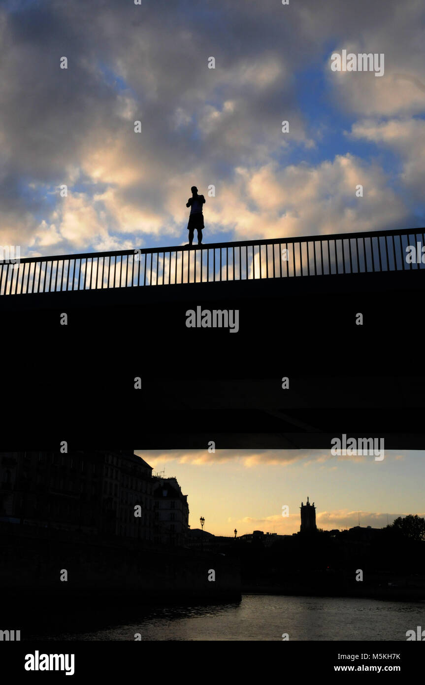 The man standing on the bridge before jumping into the river, Paris ...