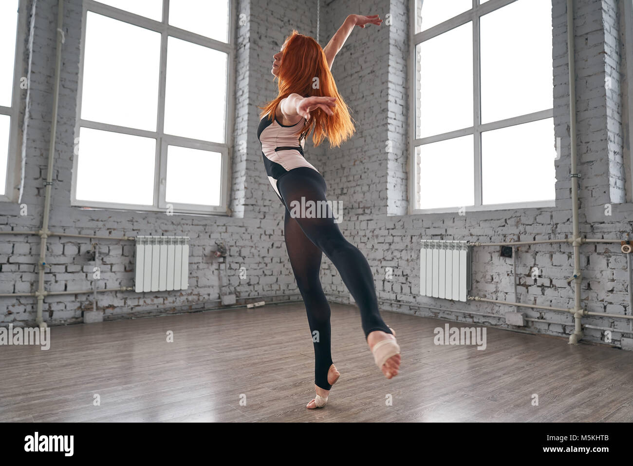 Woman dancer, in beautiful dynamic jump action figure Stock Photo - Alamy