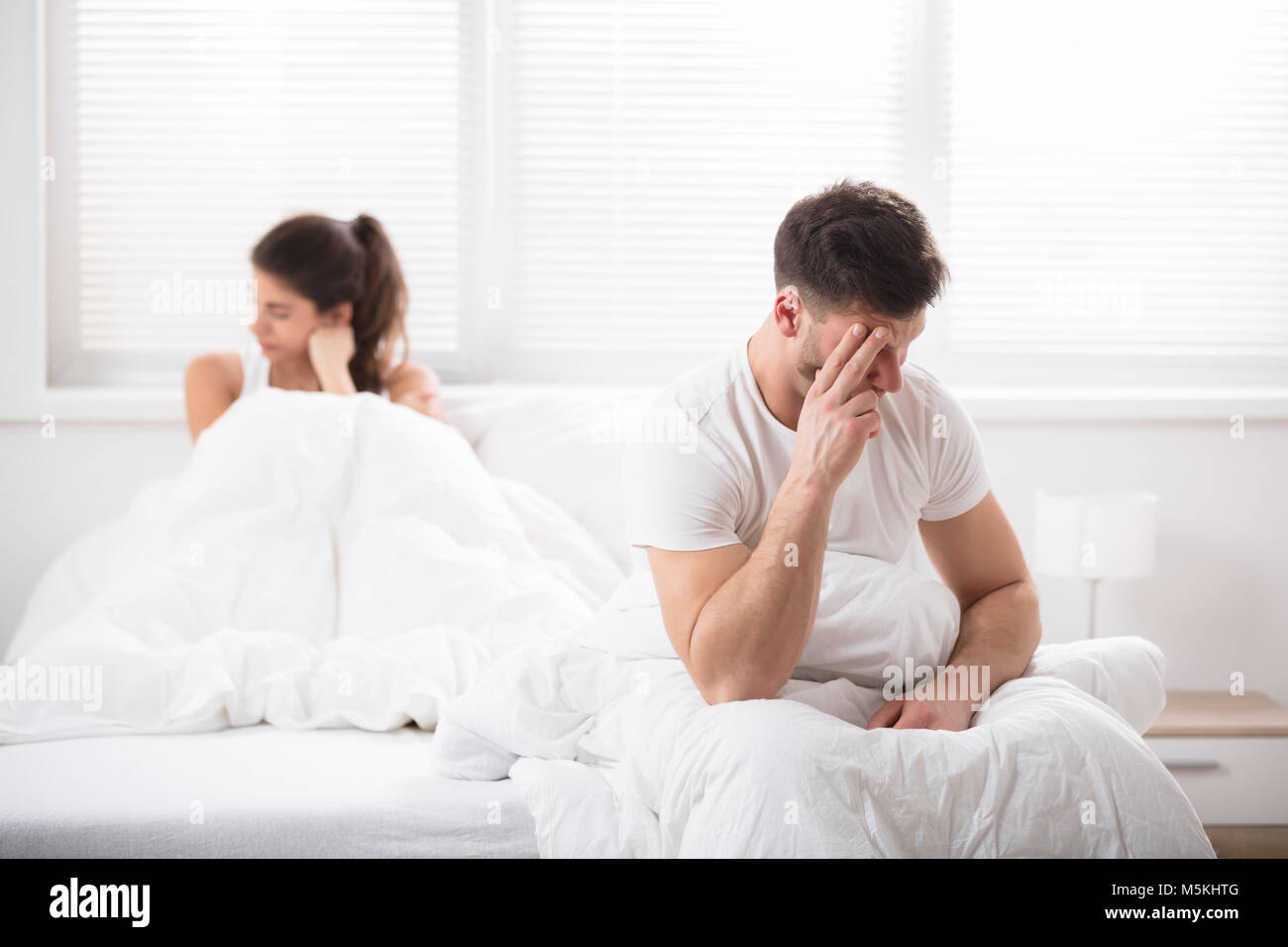 Couple angry bed hi-res stock photography and images - Alamy