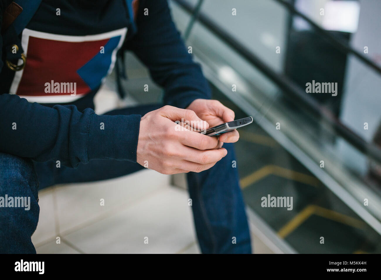 A man uses mobile phone applications for social communication. Mobile ...