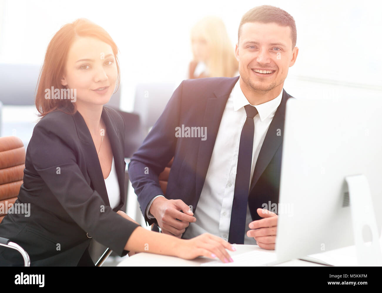 Experienced company employees sitting hi-res stock photography and ...