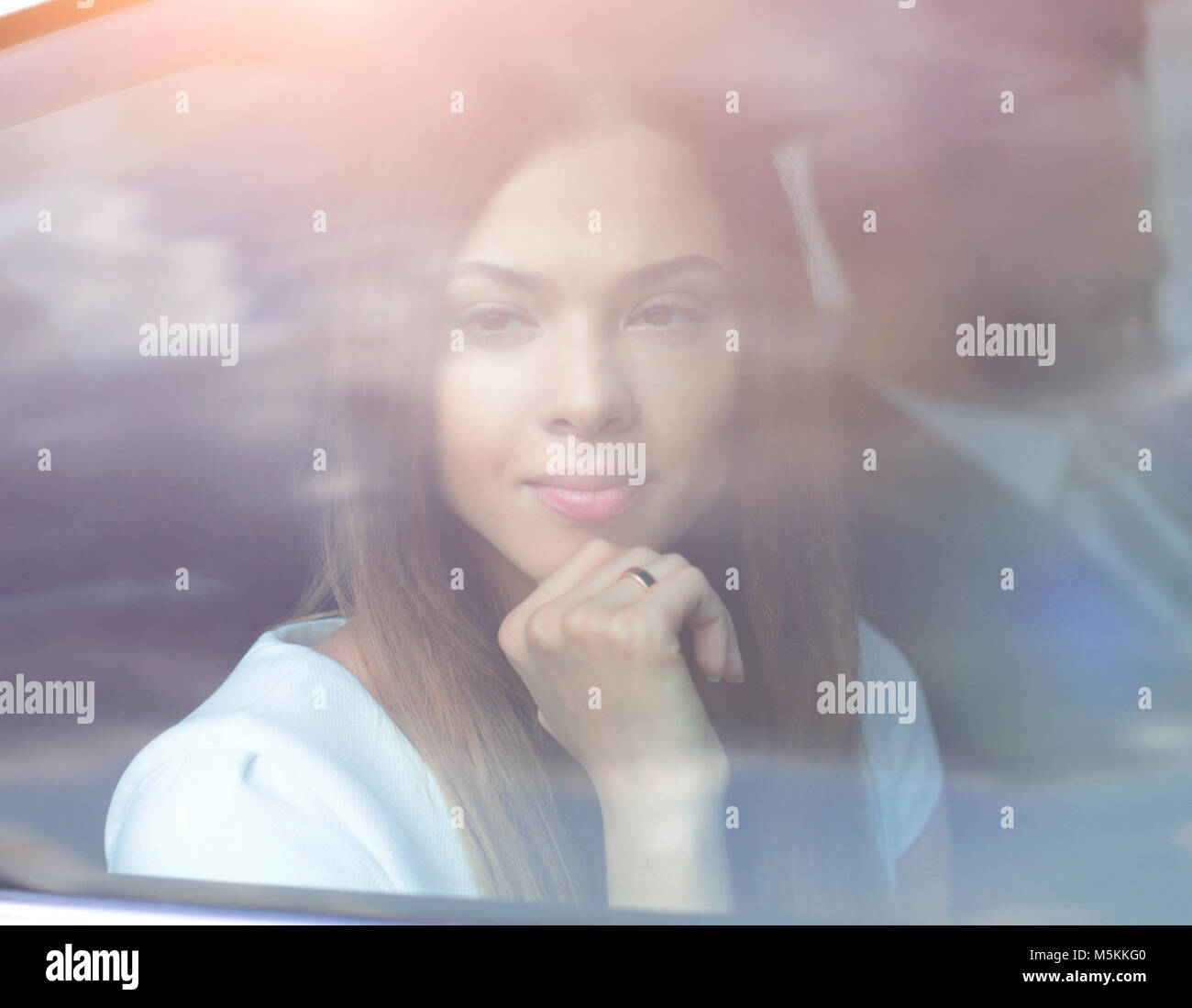 thoughtful business woman sitting in car backseat Stock Photo - Alamy thoughtful business woman sitting in car backseat Stock Photo - Alamy