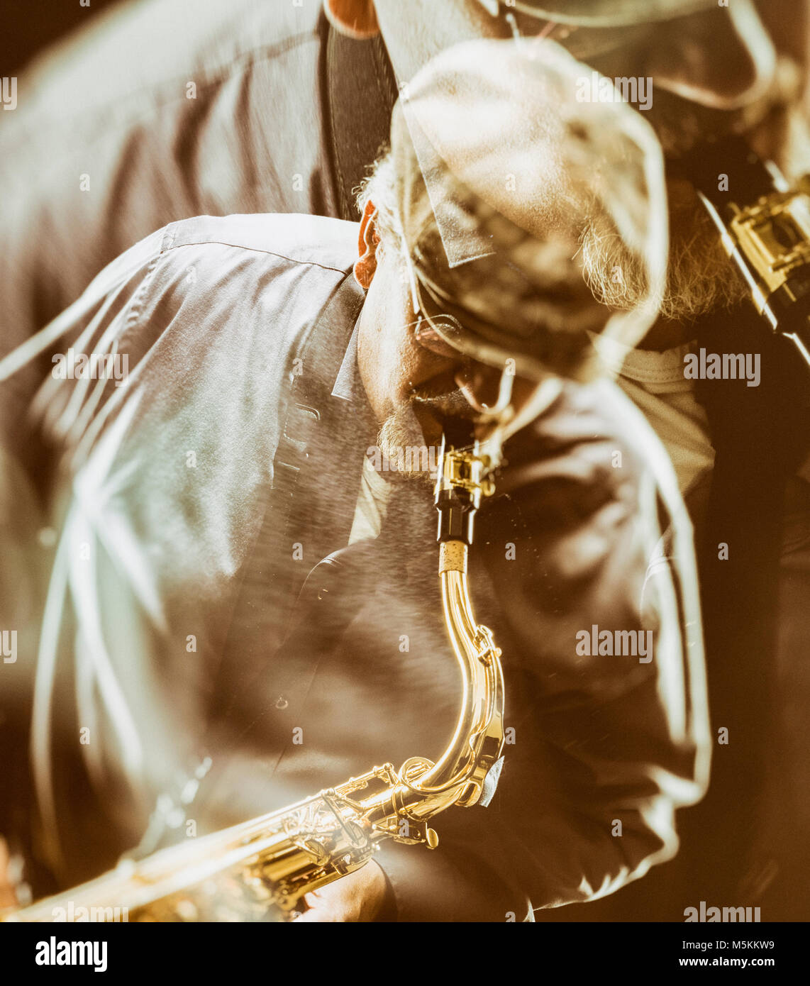 Blowing sax hi-res stock photography and images - Alamy