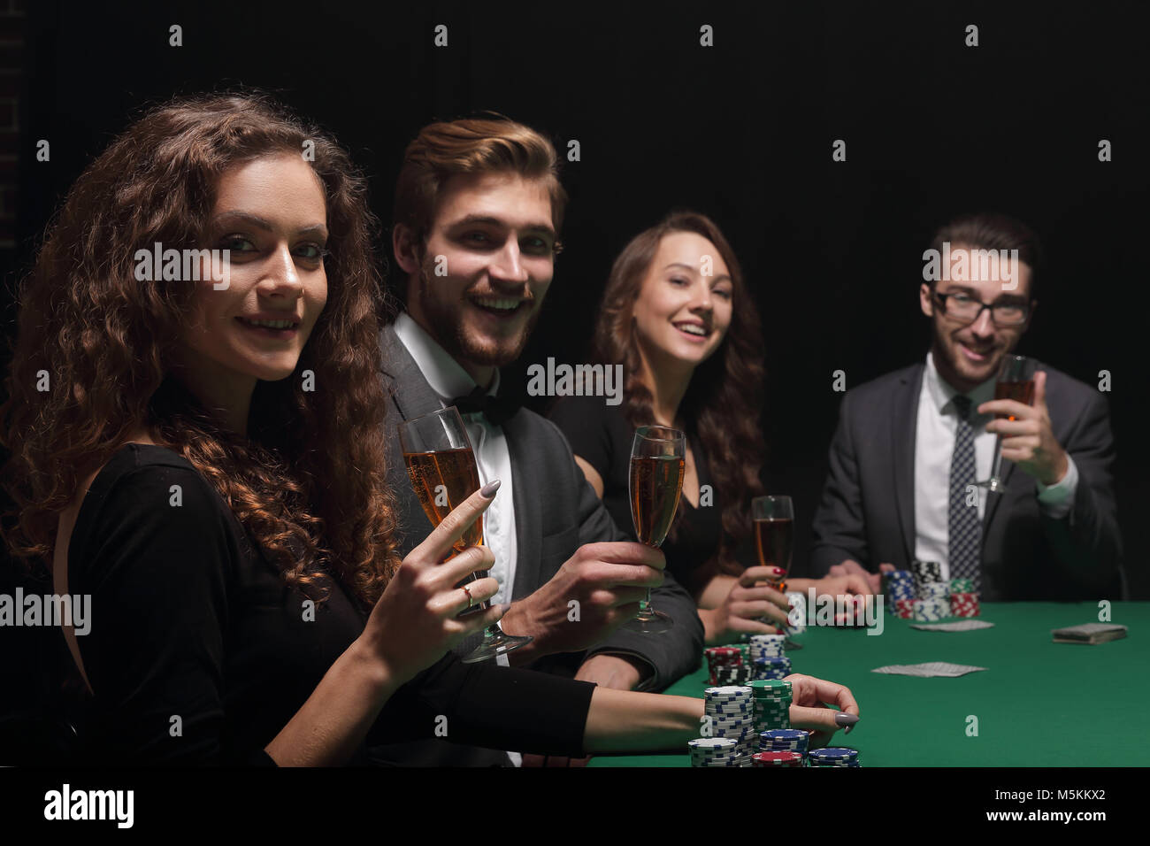 Card players around hi-res stock photography and images - Alamy