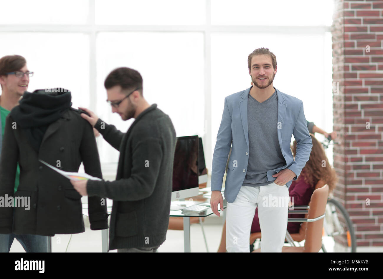 successful group of designers in a modern Studio Stock Photo - Alamy