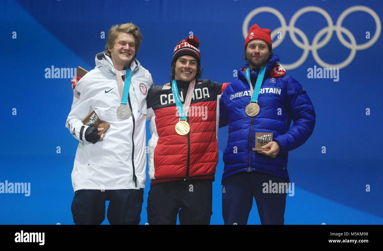 Canada's Sebastien Toutant celebrates with his Gold medal, alongside ...