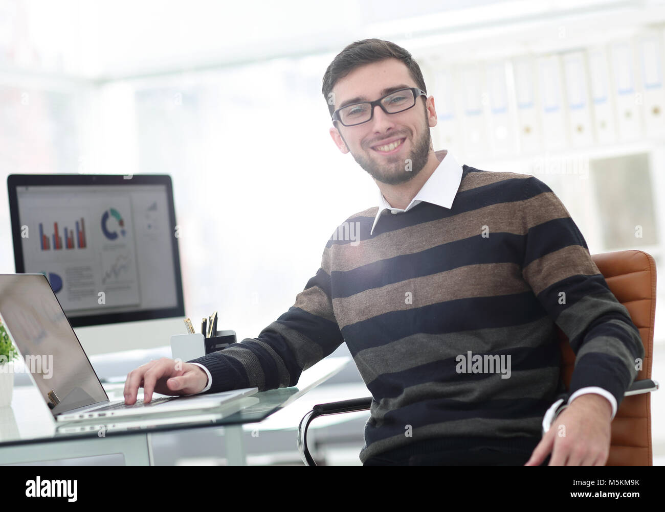 employee works with marketing schemes Stock Photo - Alamy