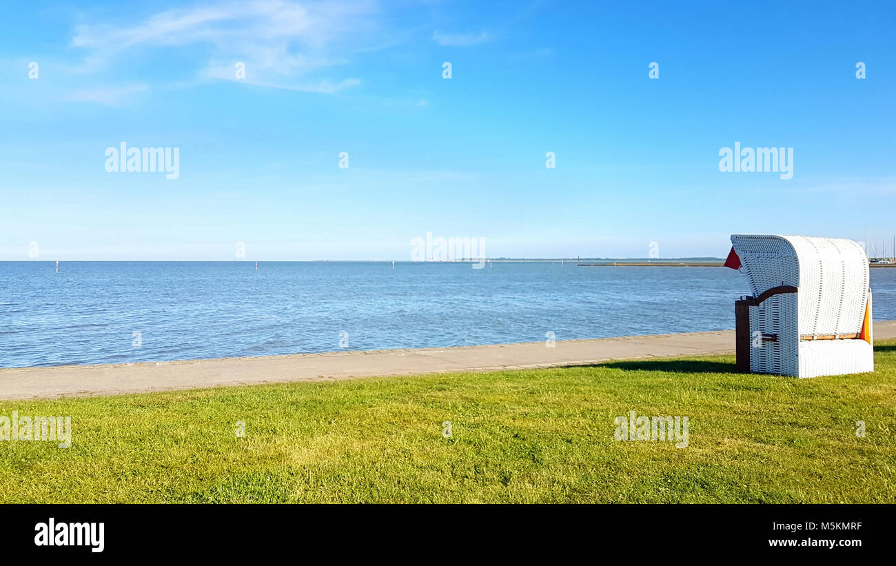 One beach chair on lawn beach at north sea Stock Photo - Alamy