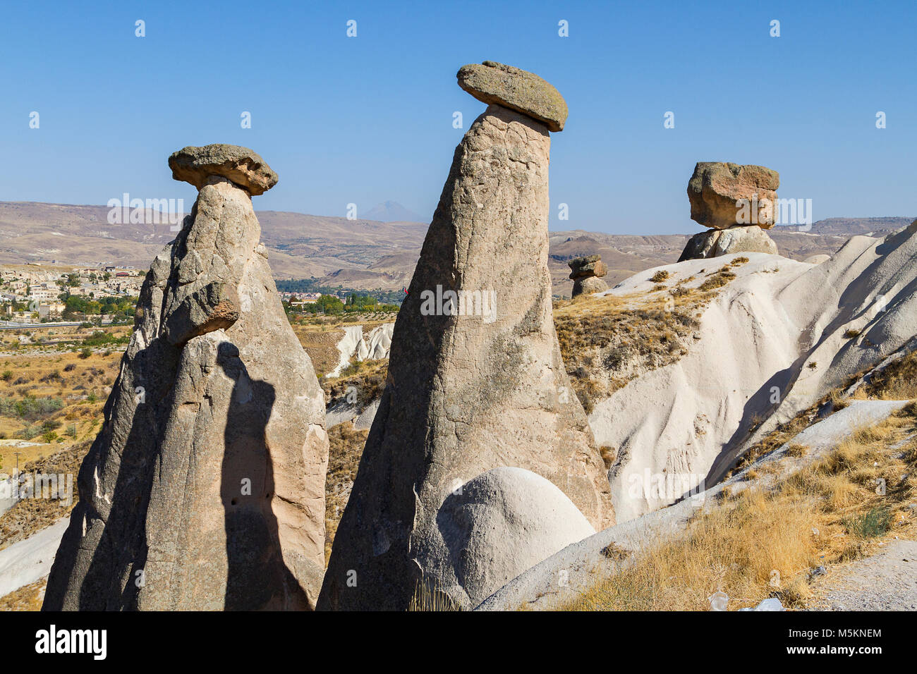 Volcanic rock formations known as Fairy Chimneys in Cappadocia, Turkey ...