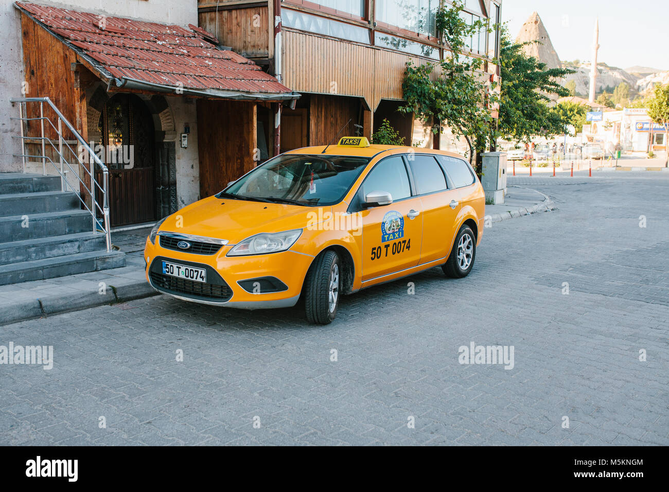 Goreme, Turkey, June 11, 2017: A traditional yellow taxi on the street ...