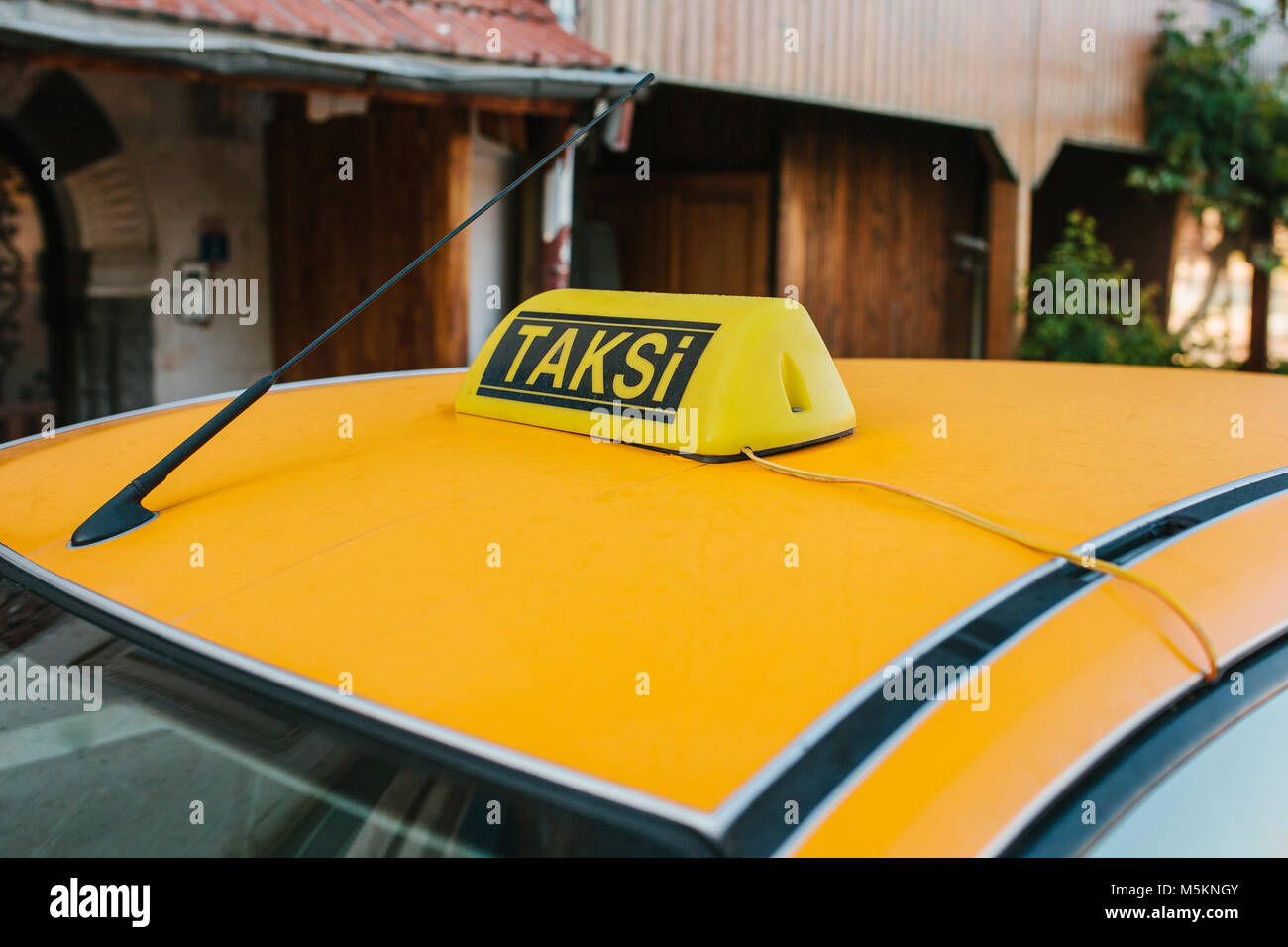 A traditional yellow taxi on the street, Turkey. Urban life style ...