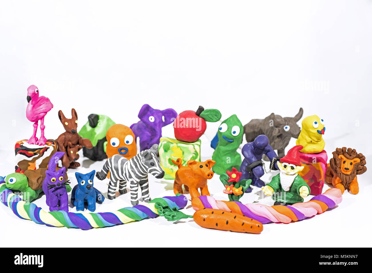 Play Clay World. Figures made from plasticine. Isolated on white ...