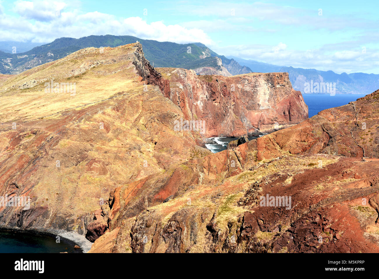 Sunny summer day. Hight mountains near ocean coasts Stock Photo - Alamy