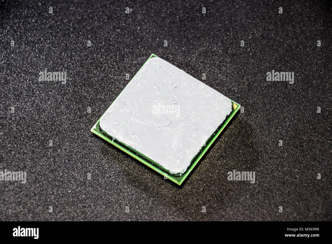 The processor of the computer with the thermal paste applied on it ...