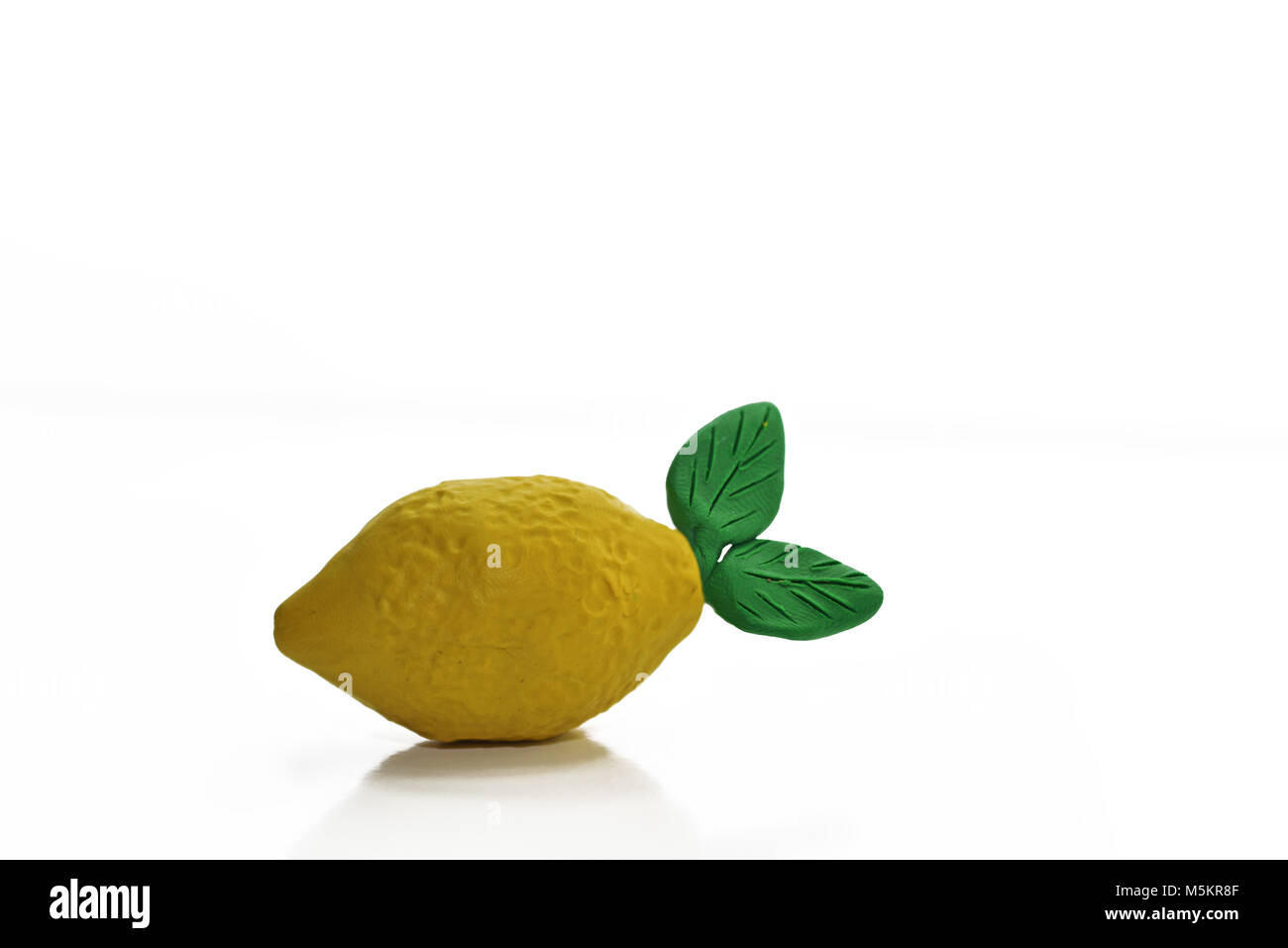 Fruits from plasticine. Isolated on white background Stock Photo - Alamy