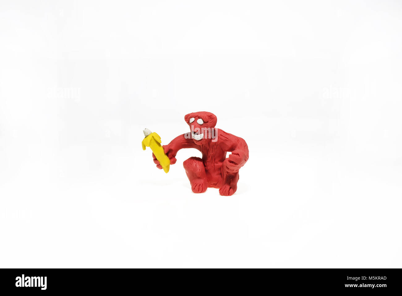 Plasticine artwork. Handmade monkey. Abstract isolated photo Stock ...