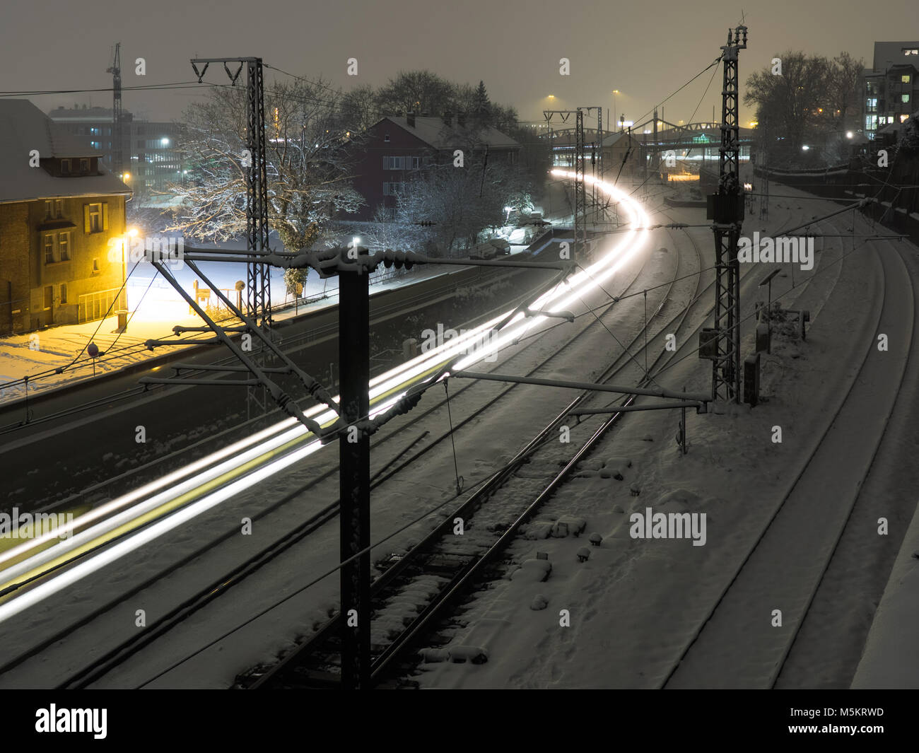 Light trail of a train at night in winter Stock Photo - Alamy