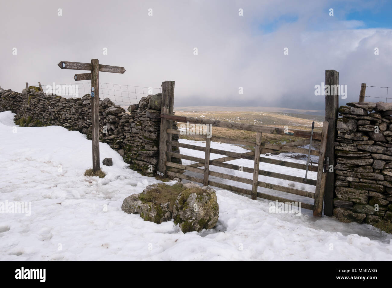 Signpost showing where the path splits between the route to Malham and ...