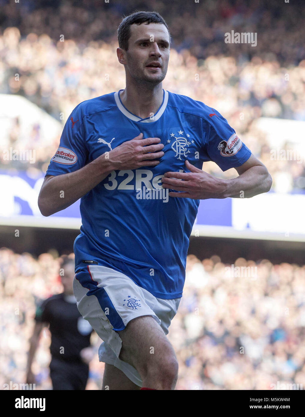 Rangers Jamie Murphy celebrates scoring his side's first goal of the ...