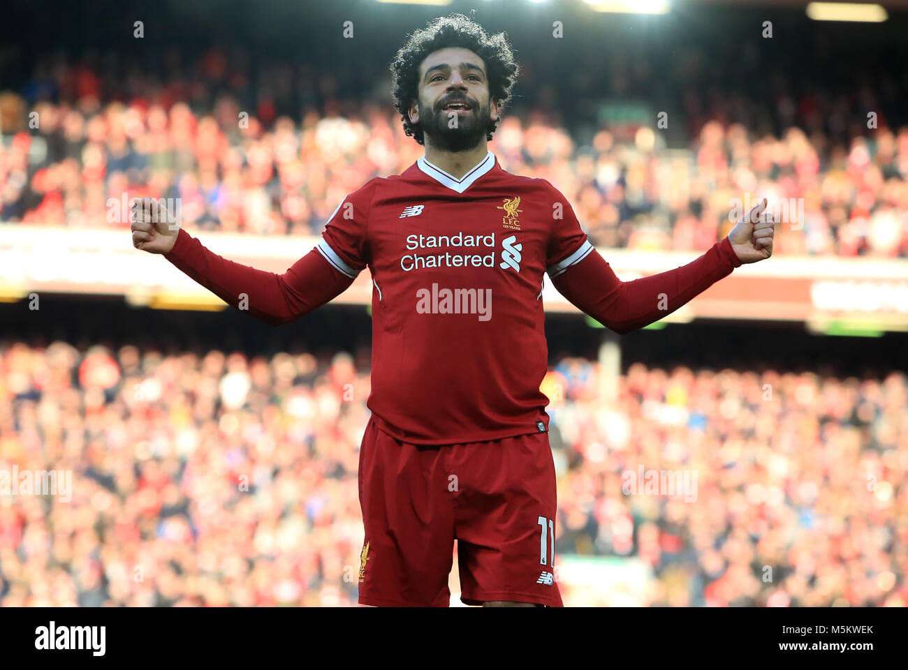 Liverpool's Mohamed Salah celebrates scoring his side's second goal of ...