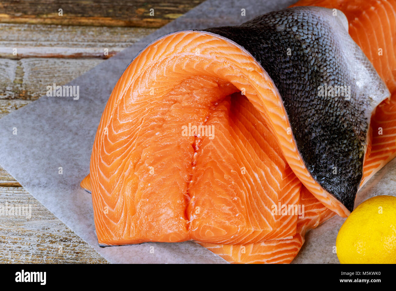 Wild Sockeye Salmon fillet on cutting board uncooked fresh salmon fish ...