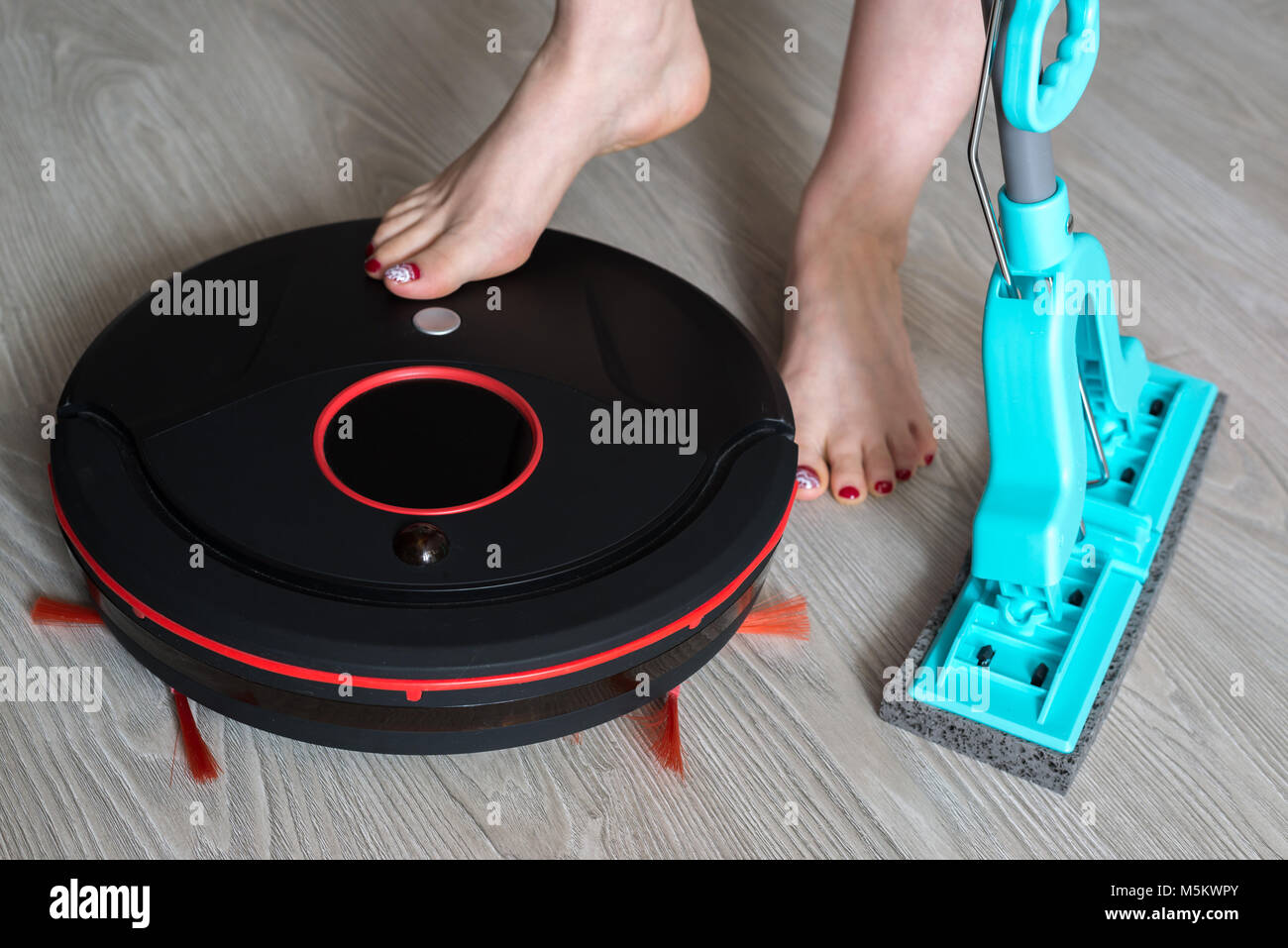 Robot vacuum cleaner and furniture hi-res stock photography and images ...