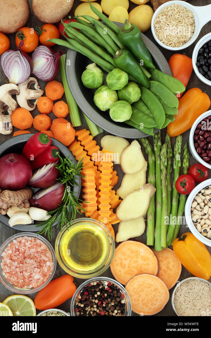 Healthy super food concept with fresh vegetables, herbs, spice, grain ...