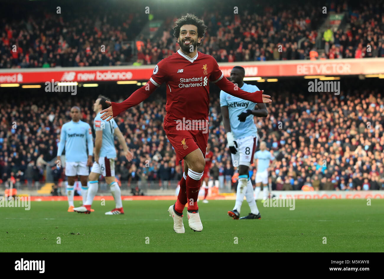 Liverpool's Mohamed Salah celebrates scoring his side's second goal of ...