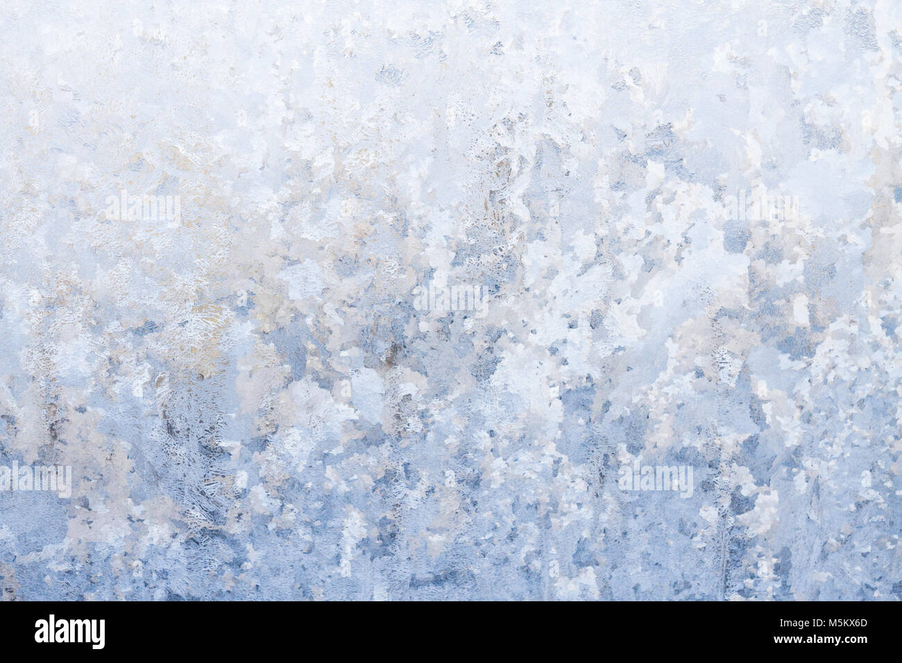 Winter frosty patterns on the frozen ice window Stock Photo - Alamy