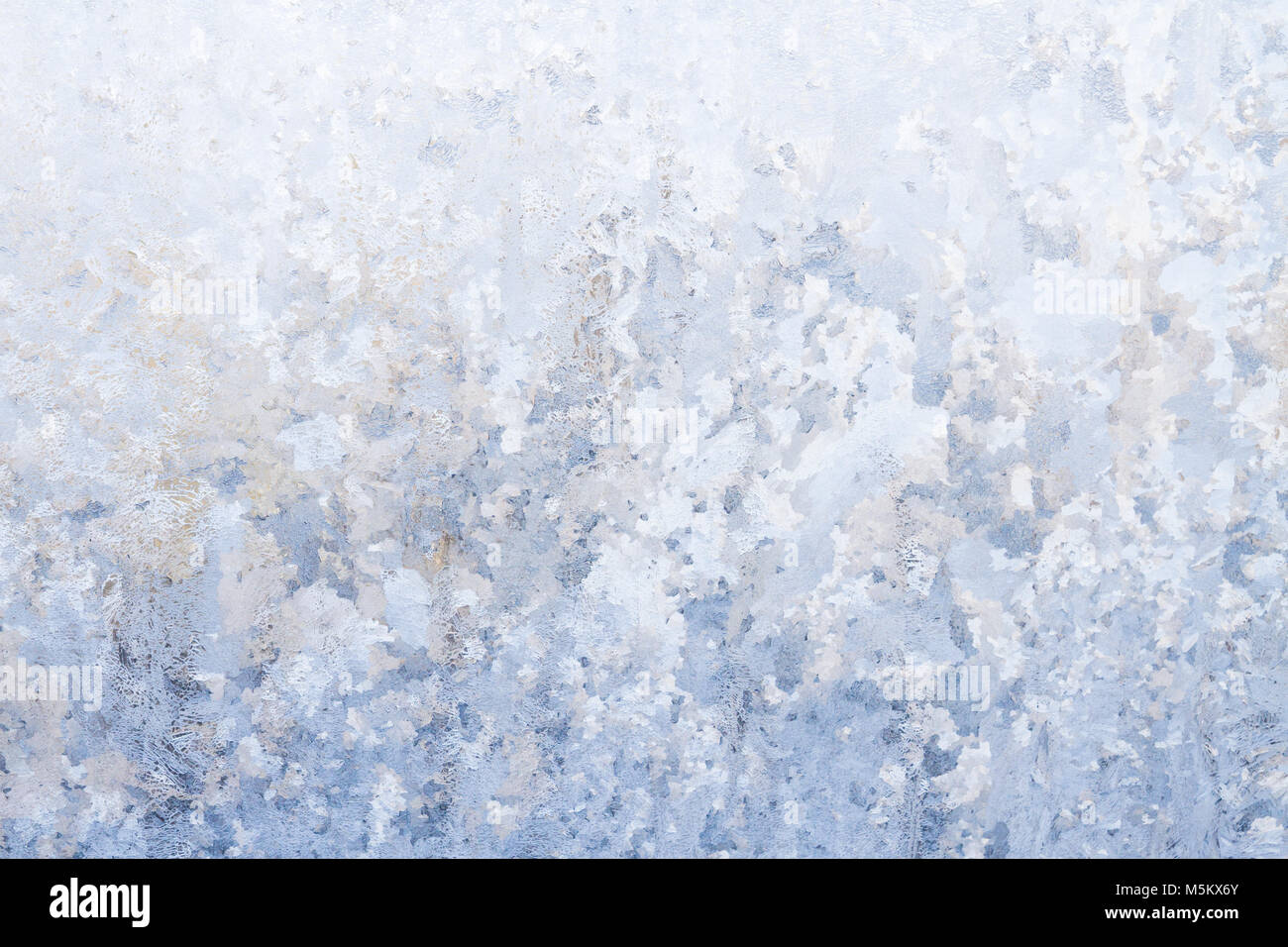 Winter frosty patterns on the frozen ice window Stock Photo - Alamy
