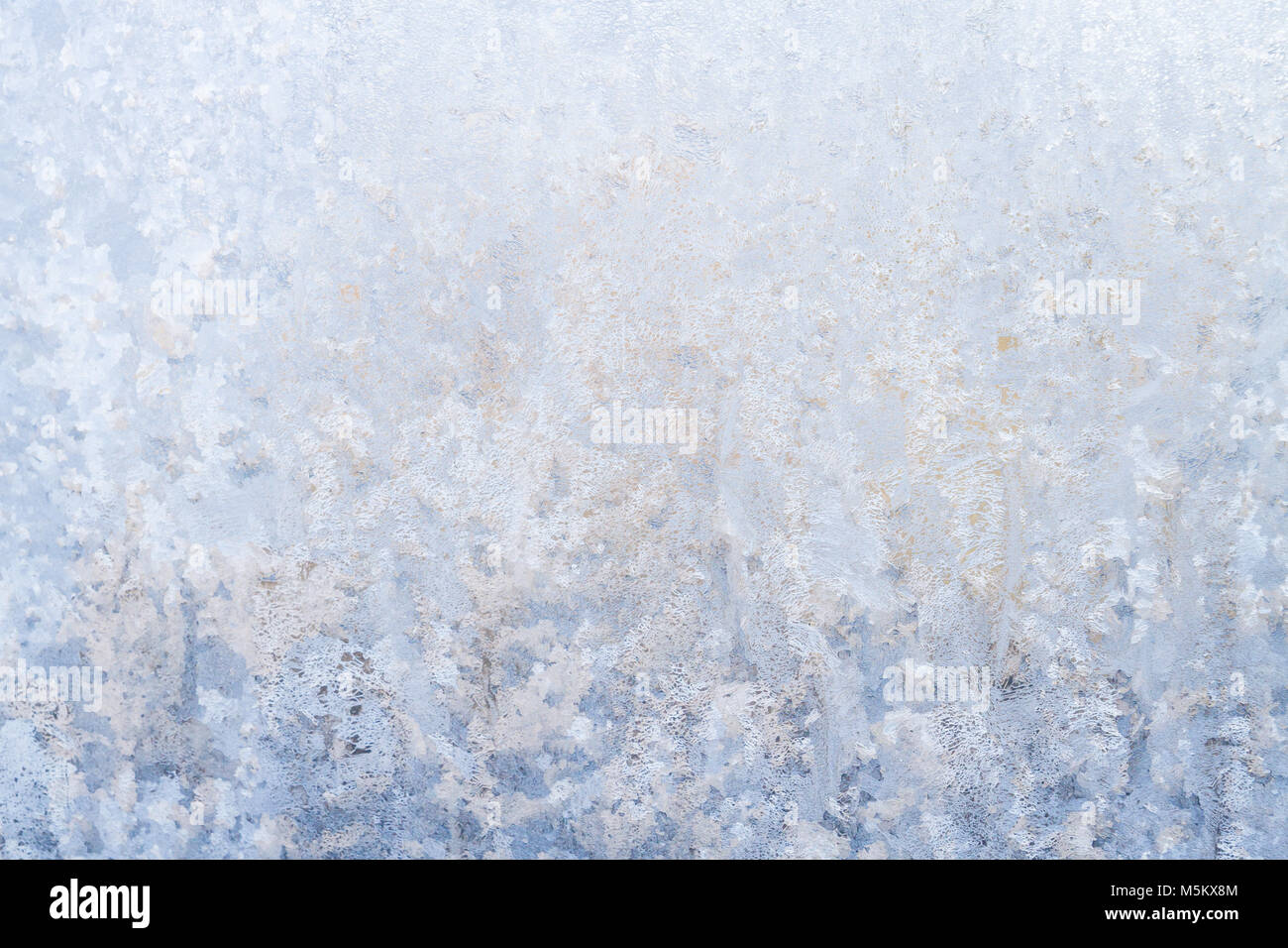 Winter frosty patterns on the frozen ice window Stock Photo - Alamy