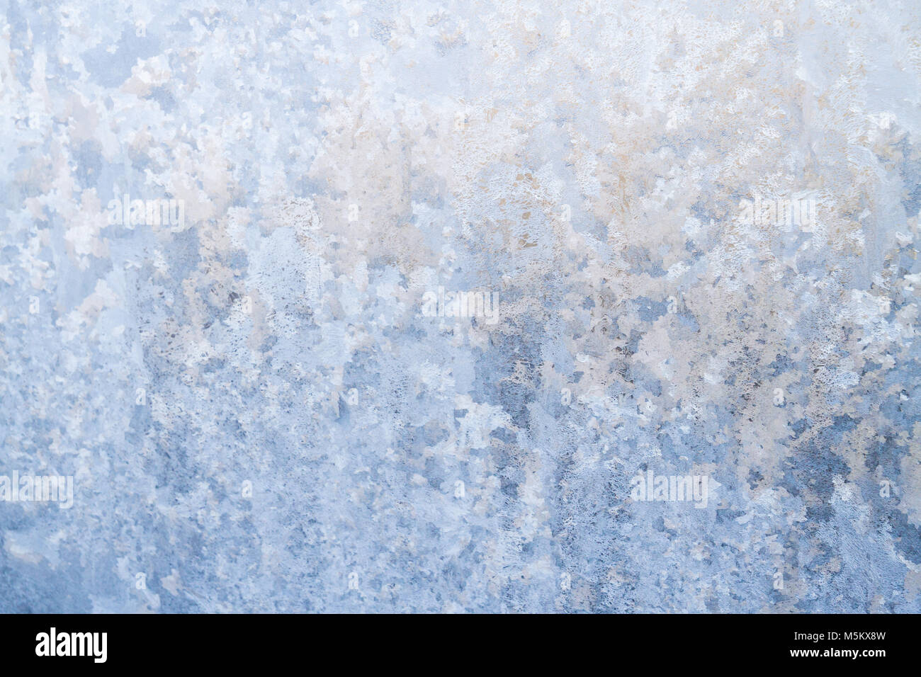 Winter frosty patterns on the frozen ice window Stock Photo - Alamy