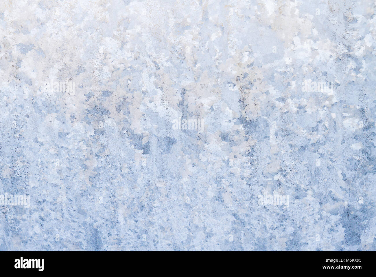Winter frosty patterns on the frozen ice window Stock Photo - Alamy
