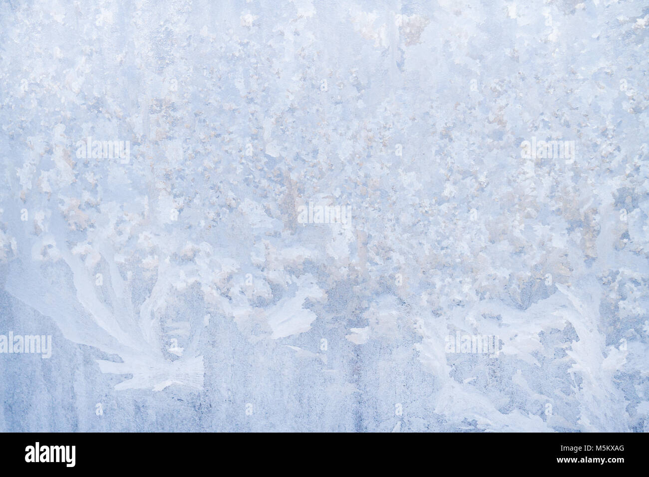 Winter frosty patterns on the frozen ice window Stock Photo - Alamy